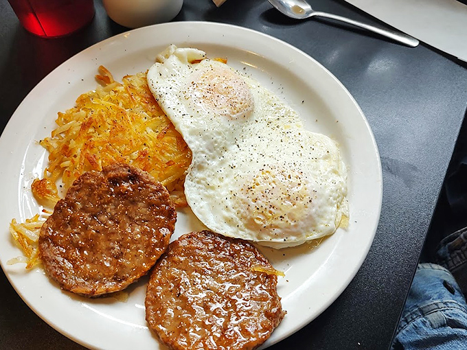 Breakfast of champions: where eggs, sausage, and hash browns unite in perfect harmony on a plate that means business.
