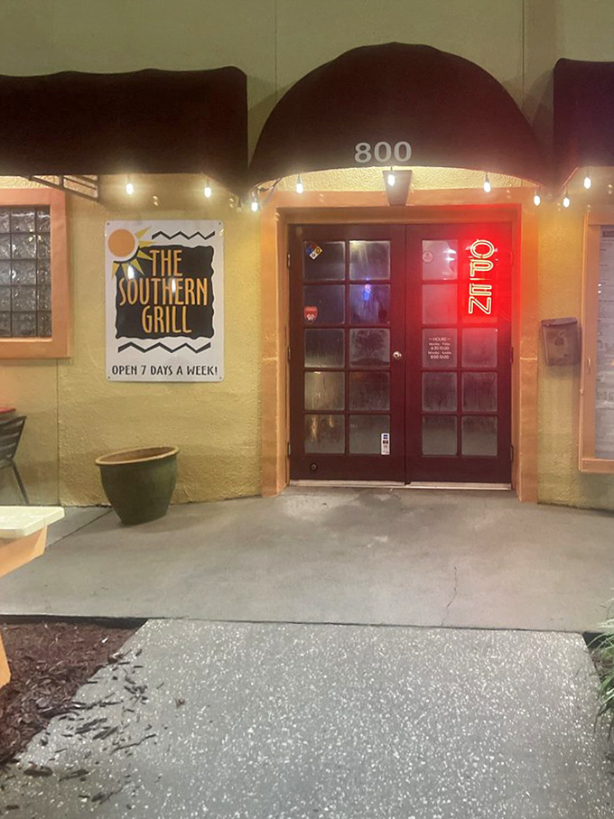 The entrance beckons with neon promise, like a lighthouse guiding hungry ships safely to port through seas of mediocre dining options.