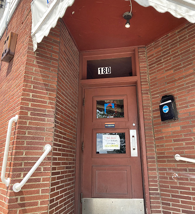 The entrance to chicken paradise is appropriately humble&mdash;no velvet ropes or hosts with iPads, just a door that's welcomed countless hungry visitors.