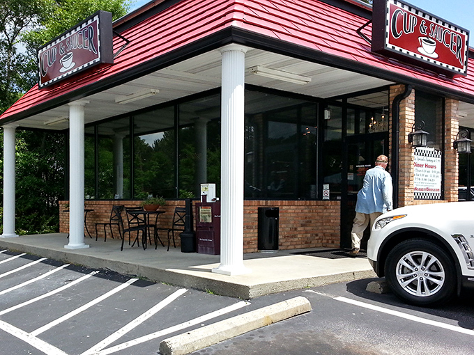 Classic diner entrance with white columns that say, "Yes, we take our breakfast seriously enough to make it look like a tiny White House."