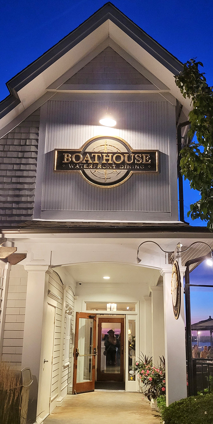 As evening falls, the Boat House glows like a lighthouse for hungry travelers&mdash;a beacon of culinary delights against the twilight sky.