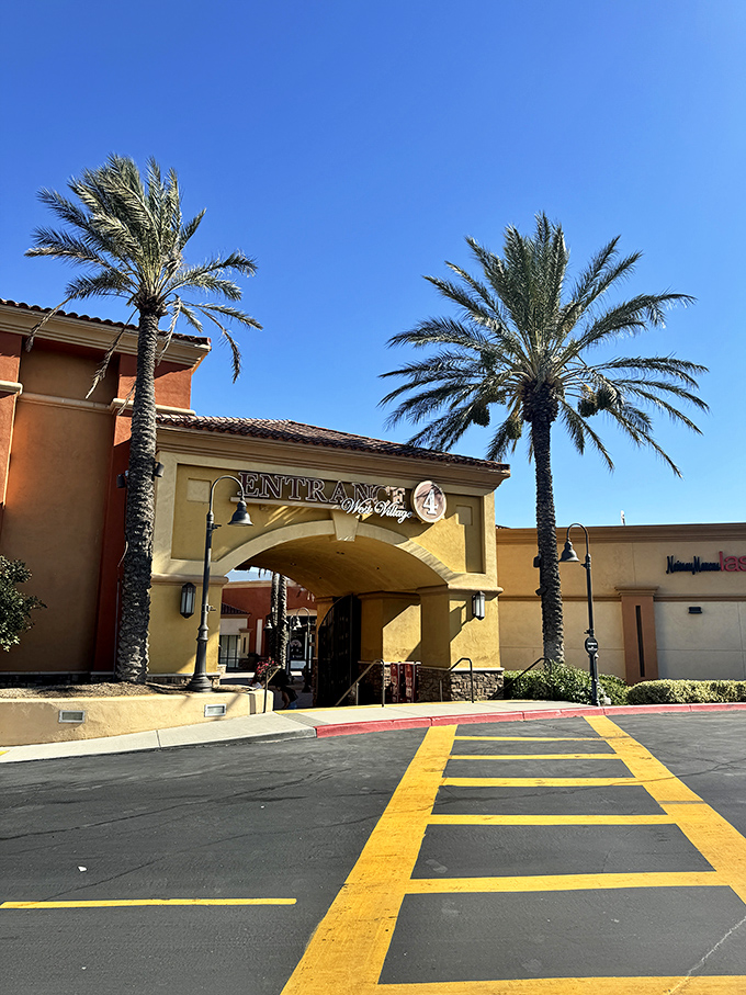 Palm trees stand sentinel at the entrance to Center 4, nature's exclamation points on a shopping paradise.