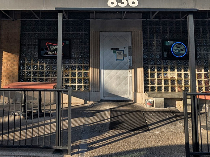 The entrance to Slyder's stands like a portal to simpler times, when food was judged by taste rather than Instagram potential.