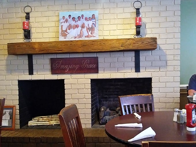 Nothing says "stay awhile" like a brick fireplace adorned with "Amazing Grace"&mdash;a reminder that some blessings come with gravy on the side.