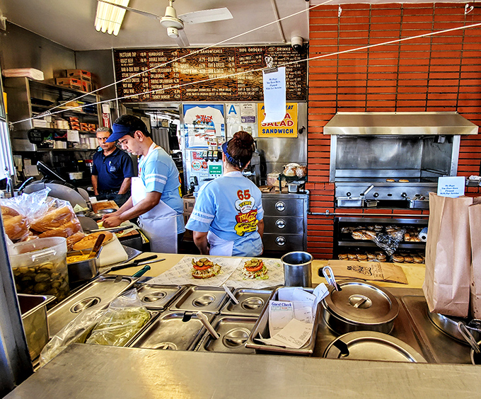 Where the magic happens: The assembly line of deliciousness operates with the precision of a Swiss watch and the soul of a jazz quartet.