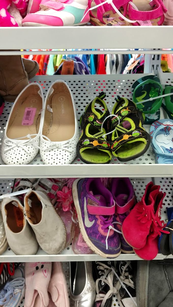 The footwear section tells tales of adventures taken and those yet to come – from barely-worn ballet flats to neon kids' sneakers.