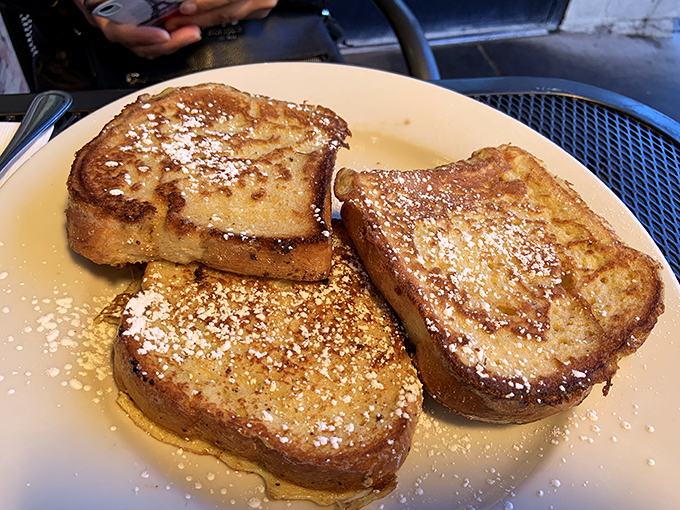 French toast so perfectly golden and dusted with powdered sugar, it makes you wonder if your grandmother secretly moonlights in Peg's kitchen.