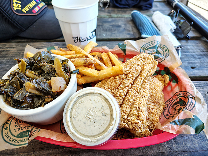 Collard greens, crispy fish, and fries &ndash; the holy trinity of Southern comfort that makes you wonder why anyone bothers with fancy food.
