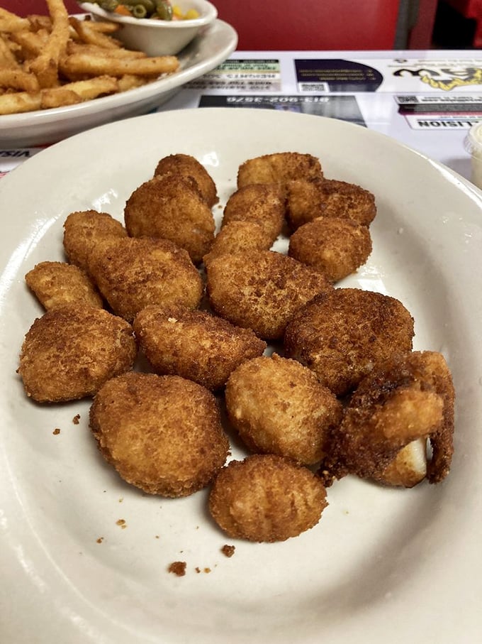 Golden-fried scallops that could convert seafood skeptics&mdash;crispy outside, tender inside, and completely worth the trip to Tampa.