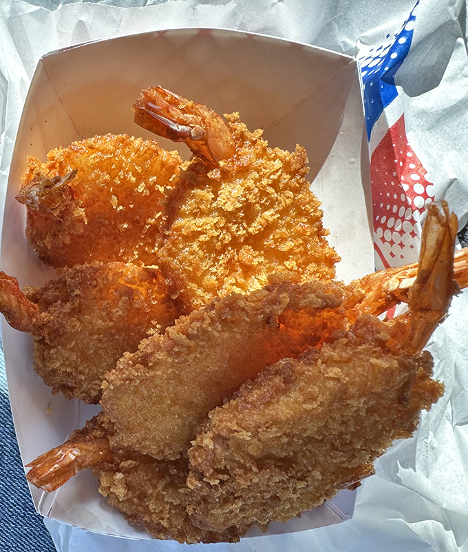 These golden-battered shrimp aren't just fried &ndash; they're transformed into crunchy vessels of seafood perfection that would make coastal restaurants jealous. 