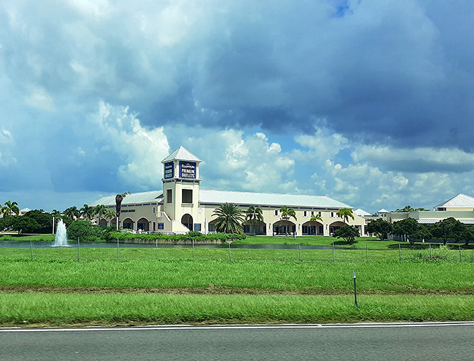 From the highway, Ellenton Premium Outlets rises like a retail mirage, beckoning weary travelers with promises of designer labels at merciful prices.