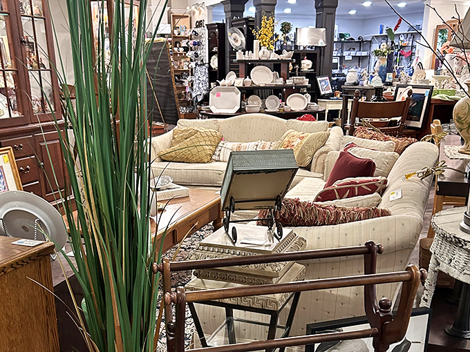 A living room display so inviting you'll want to sink into that cream sofa and declare, "This is now my reading nook&mdash;please forward my mail."