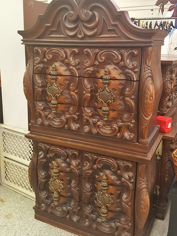 Ornate furniture pieces like this carved dresser prove someone's treasure really does become your affordable home upgrade.