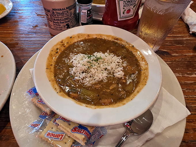 This isn't just gumbo; it's a bowl of Louisiana-Florida diplomacy—rich roux, tender vegetables, and seafood that tastes like it jumped from the Gulf this morning.