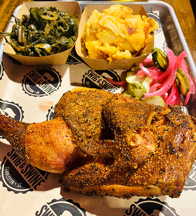 Half chicken with a spice-crusted skin that crackles with each bite, flanked by sides that refuse to be overshadowed by the main attraction.