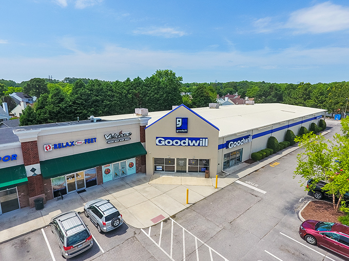 Aerial view showing Goodwill's prime location in a Virginia Beach shopping center, conveniently nestled between other local businesses.