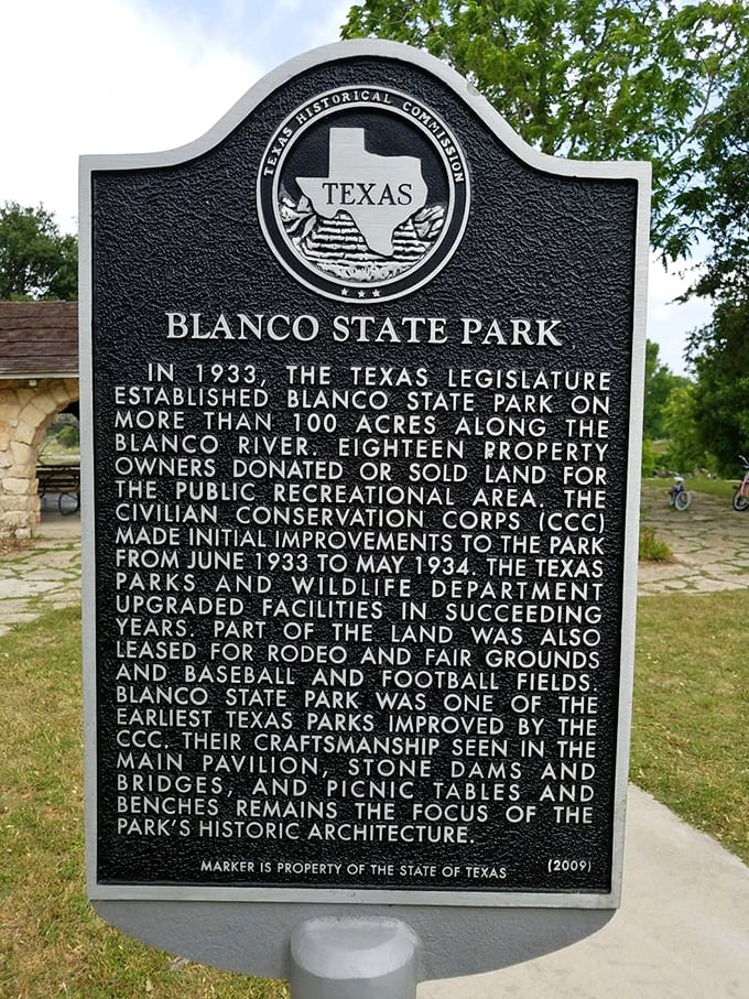 This historical marker tells the story of the park's 1933 origins and the CCC craftsmanship that still defines its rustic charm nearly a century later.