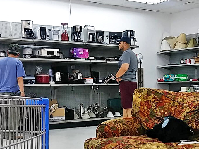 Coffee makers lined up like candidates in a caffeine election. That red model in the middle has my vote for most likely to jumpstart mornings.