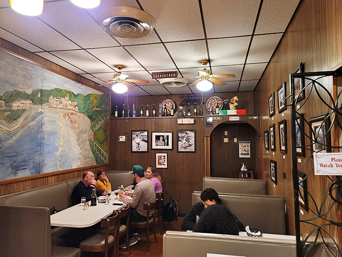 Wood paneling and Italian murals transport you straight to the old country. This isn't decoration&mdash;it's a time machine disguised as a dining room.