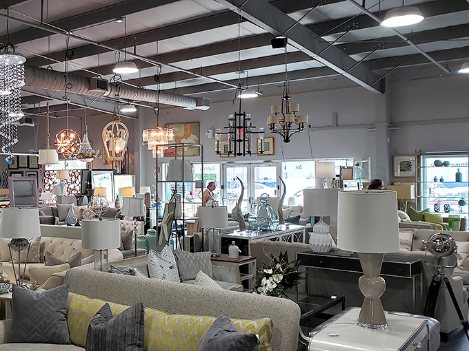 Exposed ductwork and hanging chandeliers create an industrial-chic atmosphere that makes browsing feel like an upscale gallery experience minus the pretension.