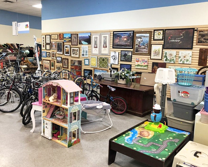 A retail landscape where bicycles, dollhouses, and framed art coexist in beautiful retail chaos. One person's decluttering is another's decorating spree.