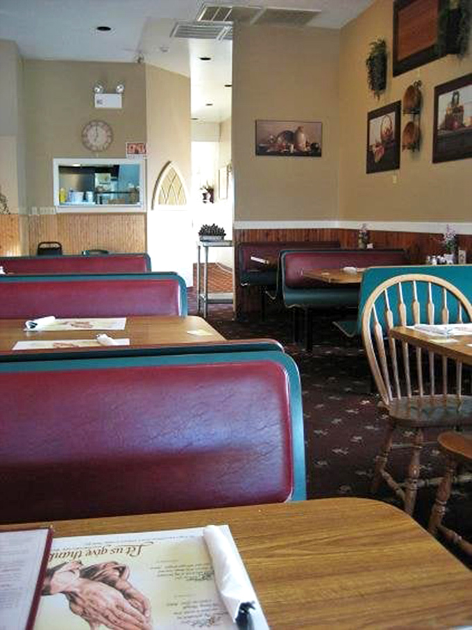 Cozy booths and thoughtful touches create the perfect backdrop for serious eating &ndash; notice how everything feels genuinely warm, not staged rustic.