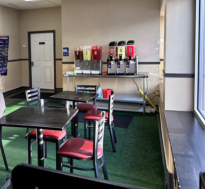 Self-serve drink station and simple seating&mdash;because they've put all their energy where it matters most: in the kitchen.