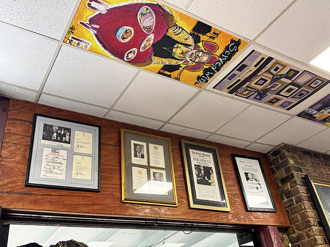 Look up! Those painted ceiling tiles and framed memorabilia tell stories of New Orleans culture while you feast below.