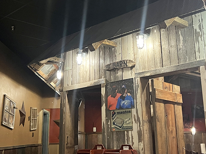 Weathered barn wood and rustic lighting transform an ordinary dining space into a countryside retreat. It's not decoration—it's a commitment to the barbecue lifestyle.