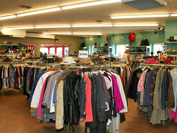 Jacket junction where leather legends and colorful contenders hang side by side, waiting for their perfect match to walk through the door.