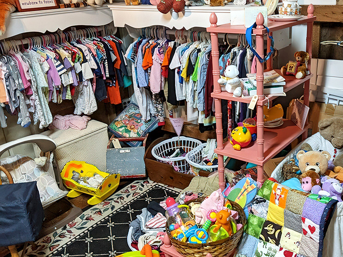 Children's clothing and toys fill this cheerful corner, proving thrift shopping works for every age and budget. 