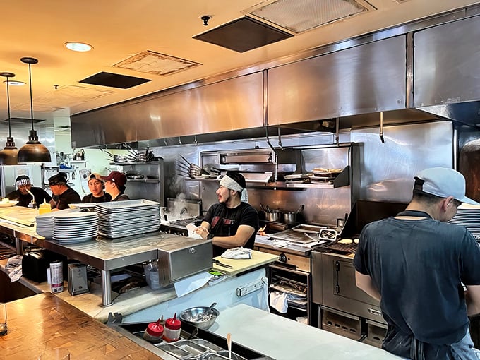 The open kitchen reveals the choreographed chaos behind culinary magic&mdash;chefs as performers in the tastiest show in town.
