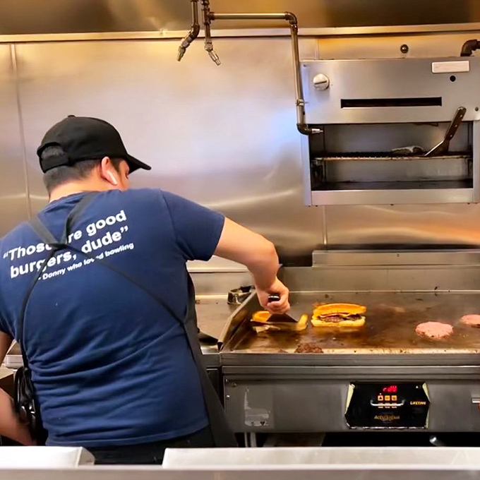 Where the magic happens: watching those patties sizzle on the griddle is practically dinner theater at its finest.