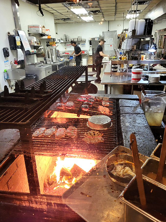 The open kitchen with its massive grill lets you watch your steak being cooked over real flames&mdash;dinner and a show.