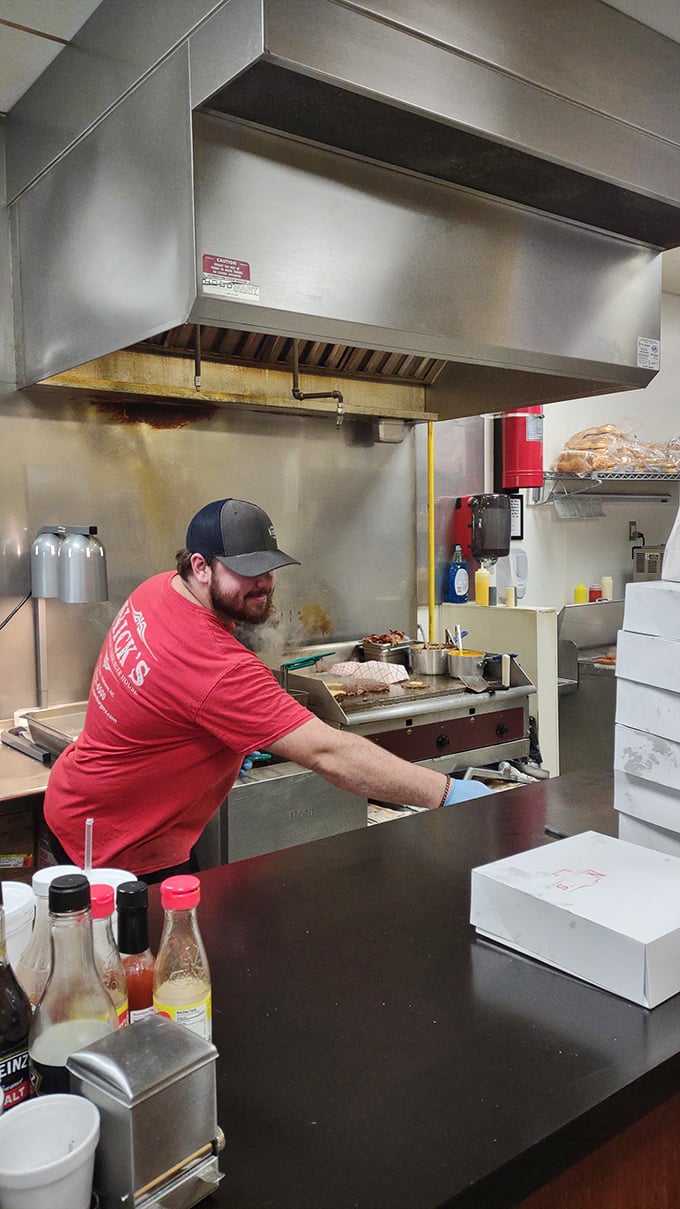Where the magic happens&mdash;Nick's kitchen crew works their culinary wizardry on that well-seasoned flat-top grill.