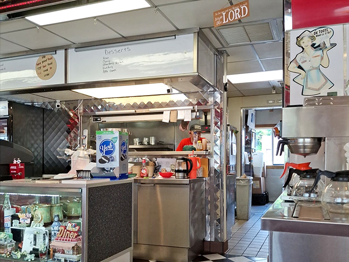 Where the magic happens. The open kitchen design lets you witness the choreography of short-order cooking that transforms simple ingredients into diner gold.