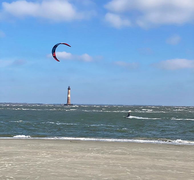 Even kite surfers pause to appreciate this historic beacon&mdash;multitasking at its most scenic.