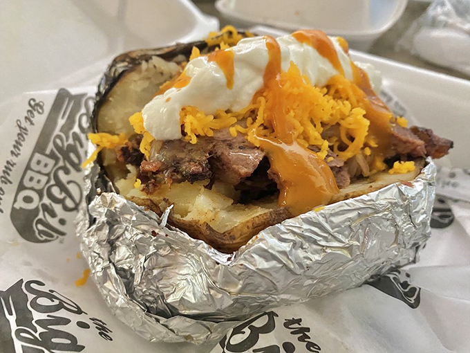 This loaded potato isn't just food&mdash;it's architecture. A foundation of spud supporting the structural integrity of meat, cheese, and sour cream with engineering precision.