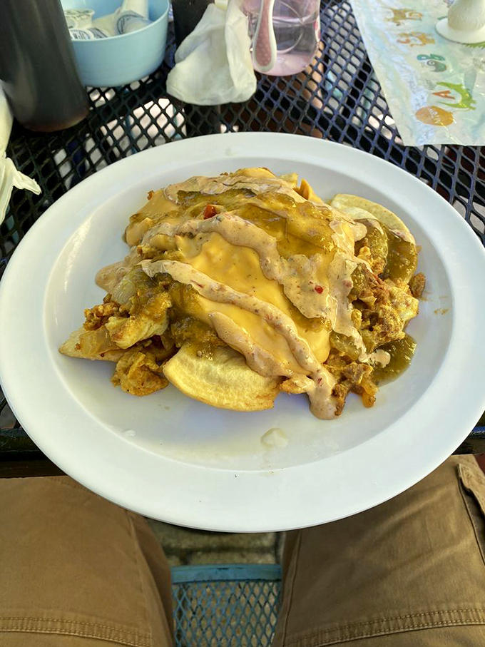 These loaded nachos aren't messing around&mdash;they're serious business with multiple sauces creating a flavor fiesta worth celebrating.