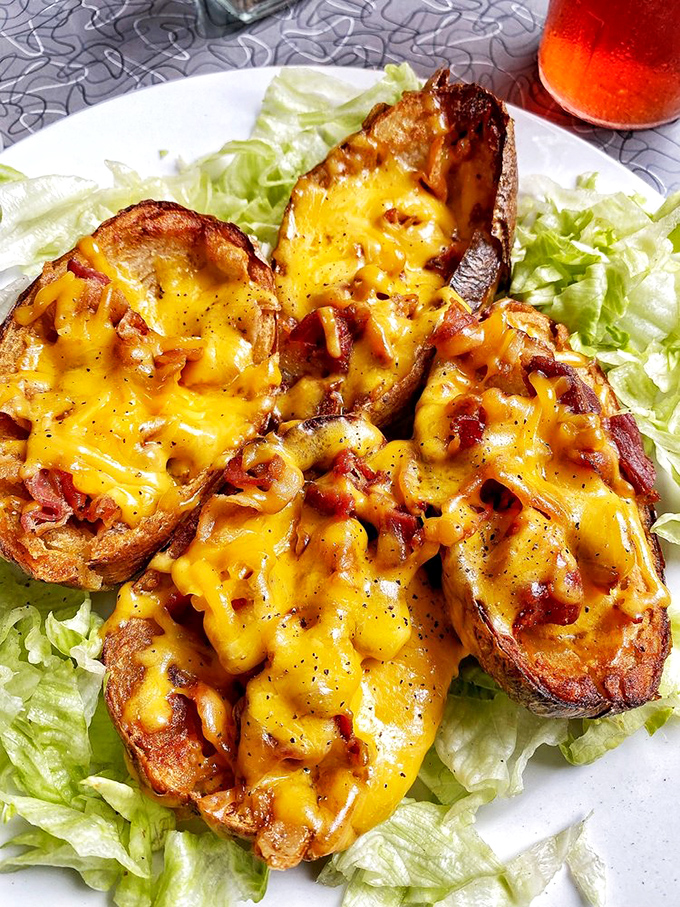 Loaded potato skins that don't skimp on the good stuff. That melted cheese is performing a spectacular magic trick right before your eyes.