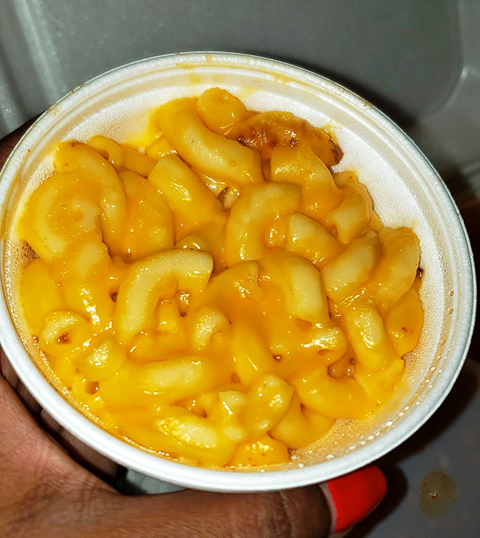 Mac and cheese that achieves that perfect golden hue—not the neon orange of processed cheese, but the rich amber of the real deal.