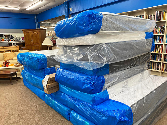 New mattresses wrapped like blue cocoons, ready to transform your sleep experience without the showroom markup. Sweet dreams are made of these deals.