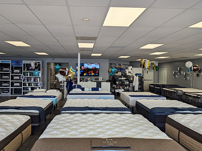 Multiple mattress displays suggest even your sleep setup deserves outlet pricing&mdash;rest easy knowing you didn't overpay for dreams.