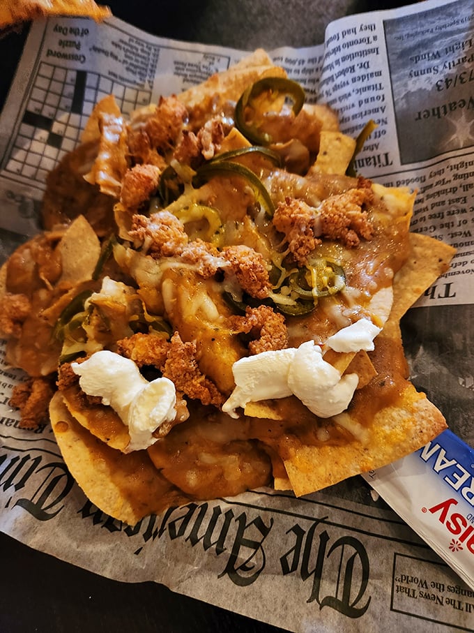 Seafood nachos &ndash; where Tex-Mex meets the Gulf Coast in a newspaper-lined basket of crispy, cheesy, seafood-topped rebellion against ordinary appetizers. 