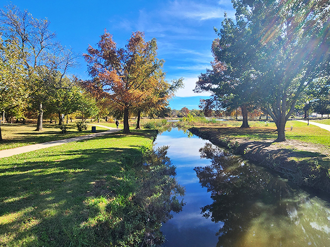 Ada's natural beauty includes peaceful streams reflecting autumn colors&mdash;nature's entertainment that costs exactly zero dollars to enjoy.