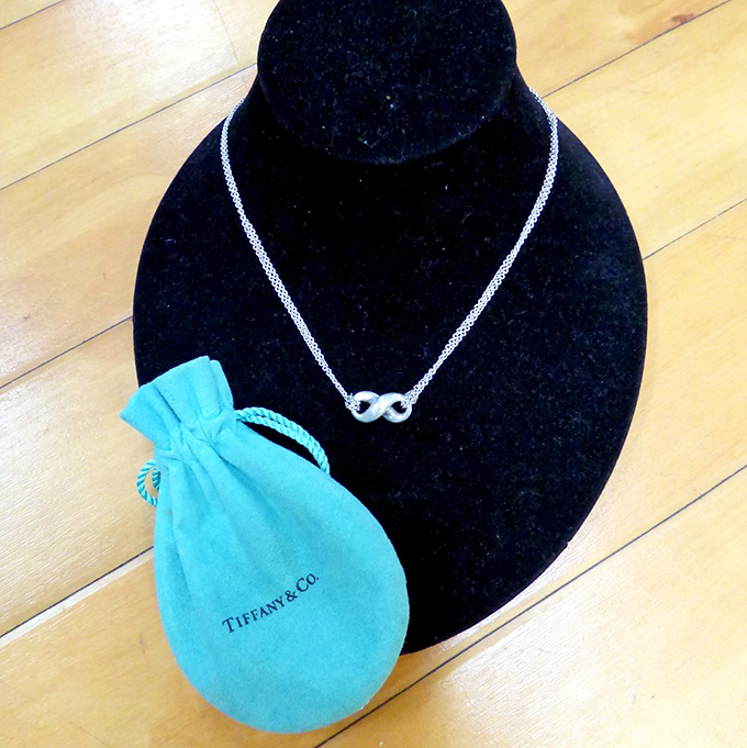 That iconic Tiffany blue pouch contains affordable luxury—proof that something small can make a big statement in your wardrobe.