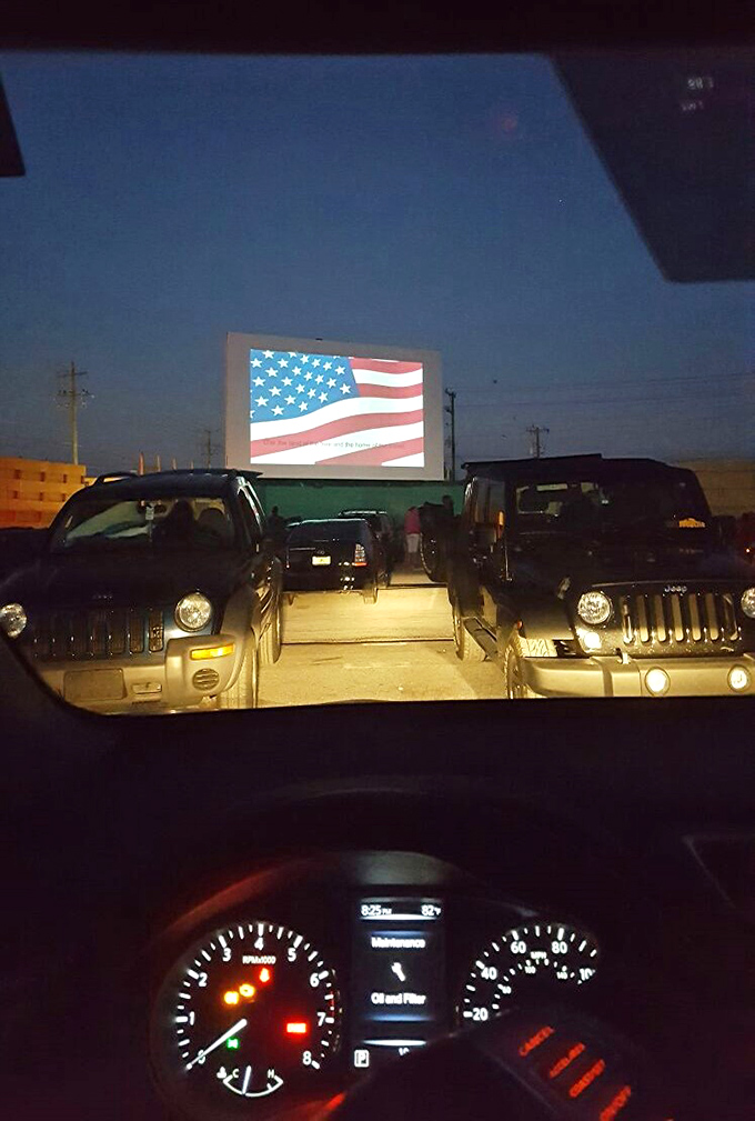 The American flag greets moviegoers&mdash;watching films under the stars feels patriotic somehow, a celebration of simple pleasures.