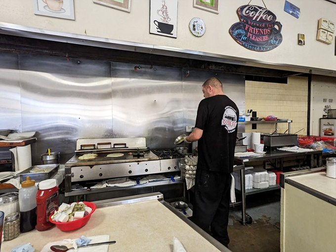 The open kitchen where breakfast magic happens. No smoke and mirrors, just skilled hands turning simple ingredients into morning masterpieces.