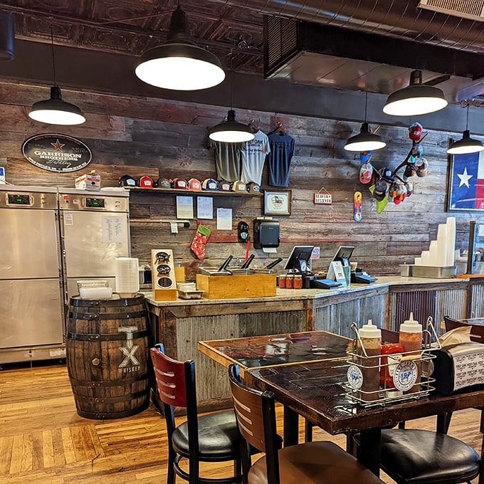 Where barbecue dreams begin: rustic wood, Texas memorabilia, and the promise of meat by the pound.