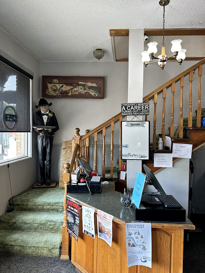 The host station and staircase&mdash;where first-timers become regulars and staff greet you like you're returning family after a long absence.